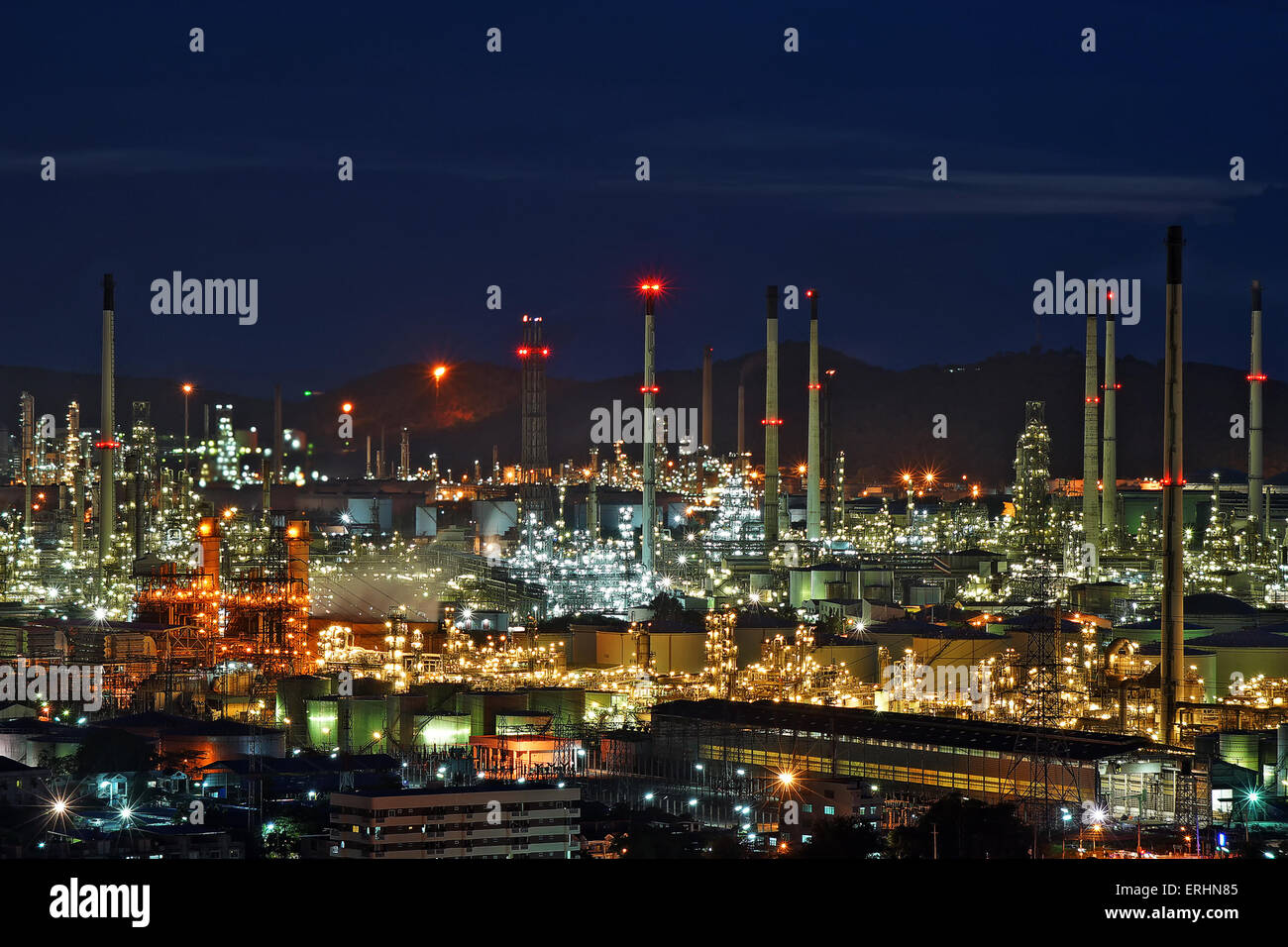 The Oil refinery with beautiful sky background Stock Photo - Alamy