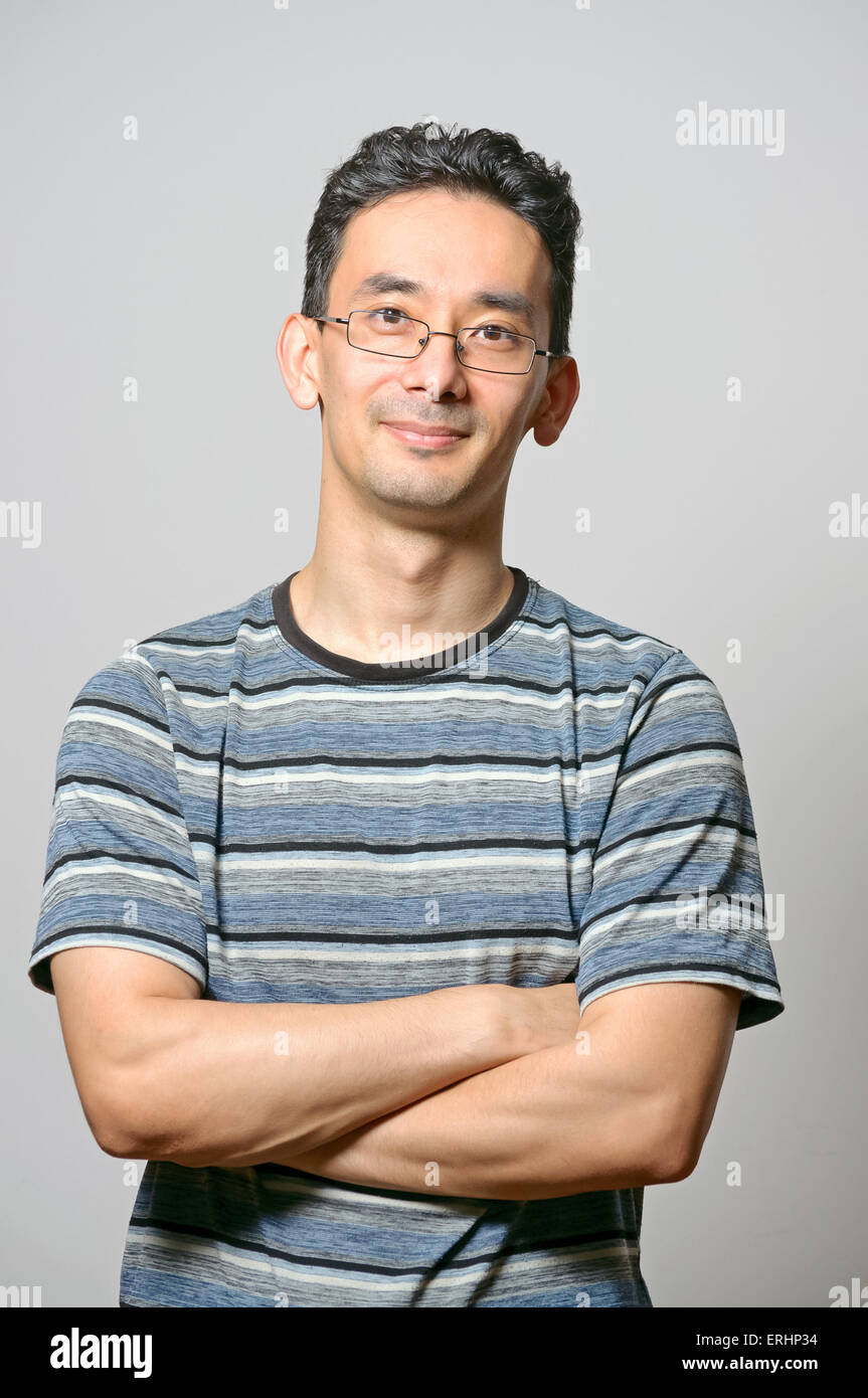 Asian male hands hi-res stock photography and images - Alamy