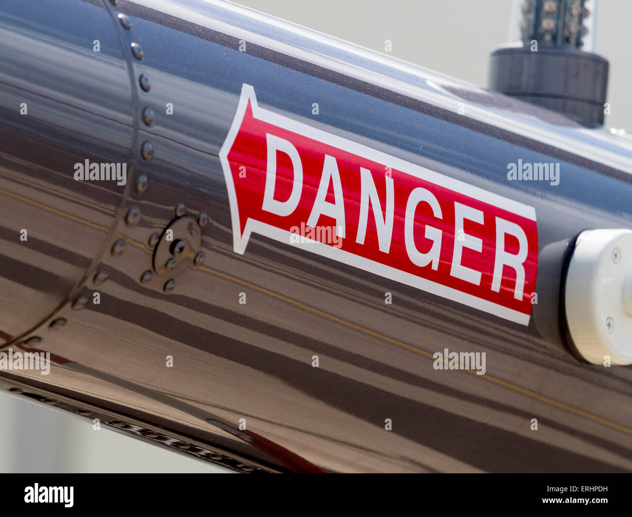 'Danger' warning sign near the tail rotor of a Robinson leisure ...