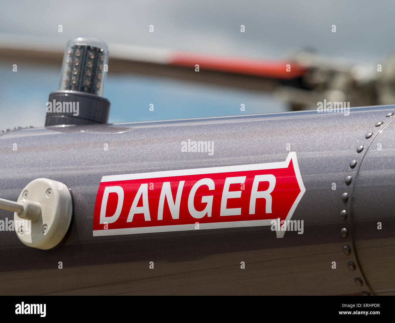 'Danger' warning sign near the tail rotor of a Robinson leisure ...