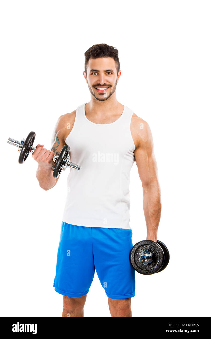 Portrait of a muscular man lifting weights, isolated over a white ...