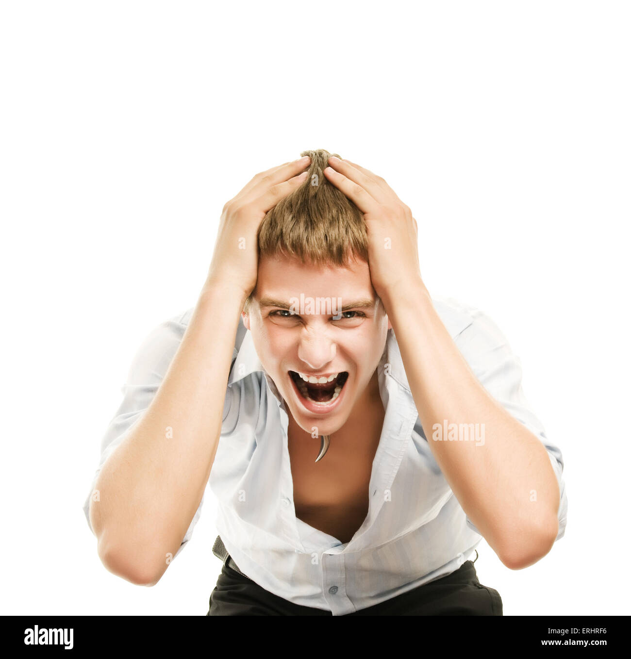 Screaming young handsome man isolated on white background Stock Photo ...
