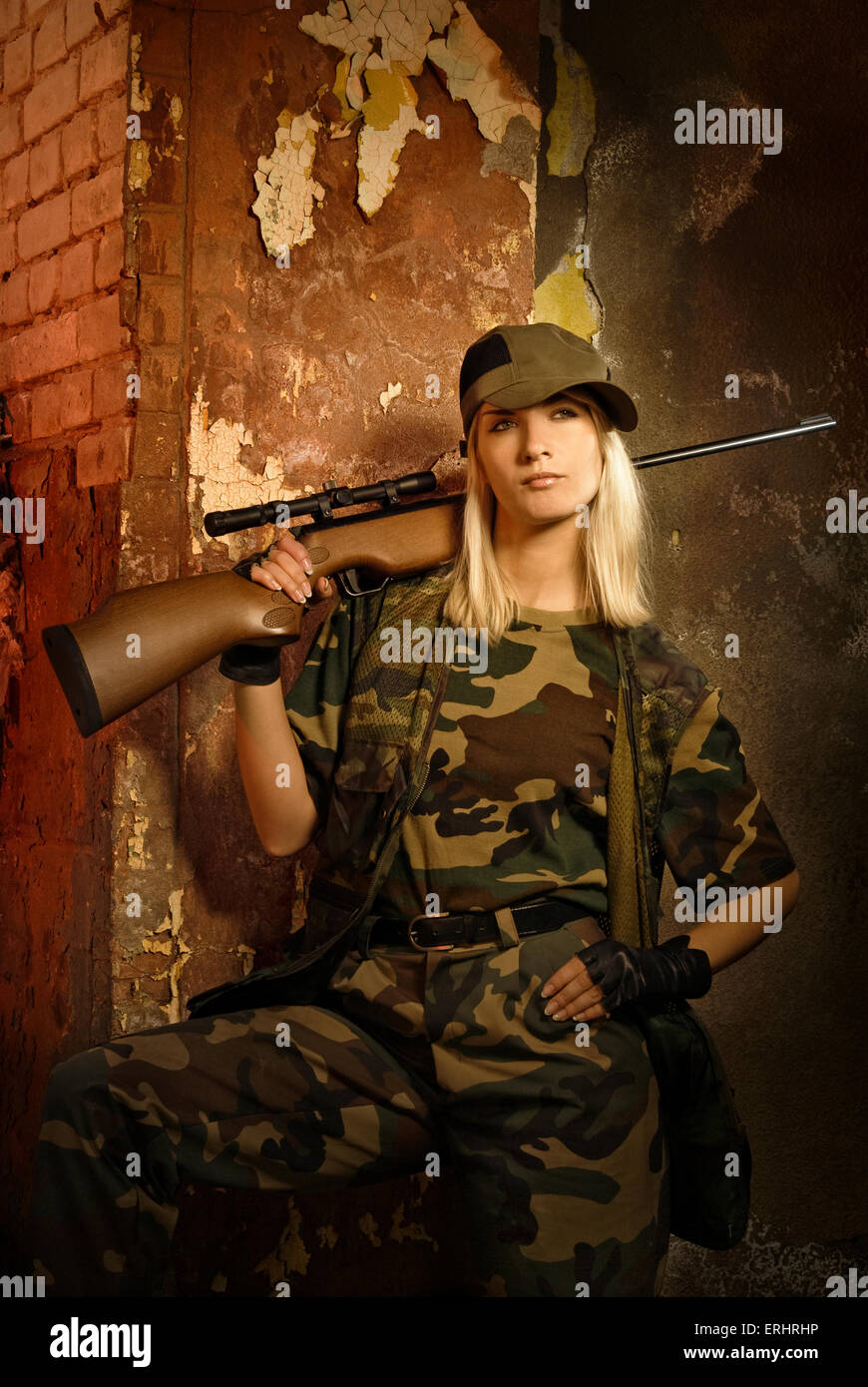 Beautiful woman soldier with a sniper rifle Stock Photo - Alamy