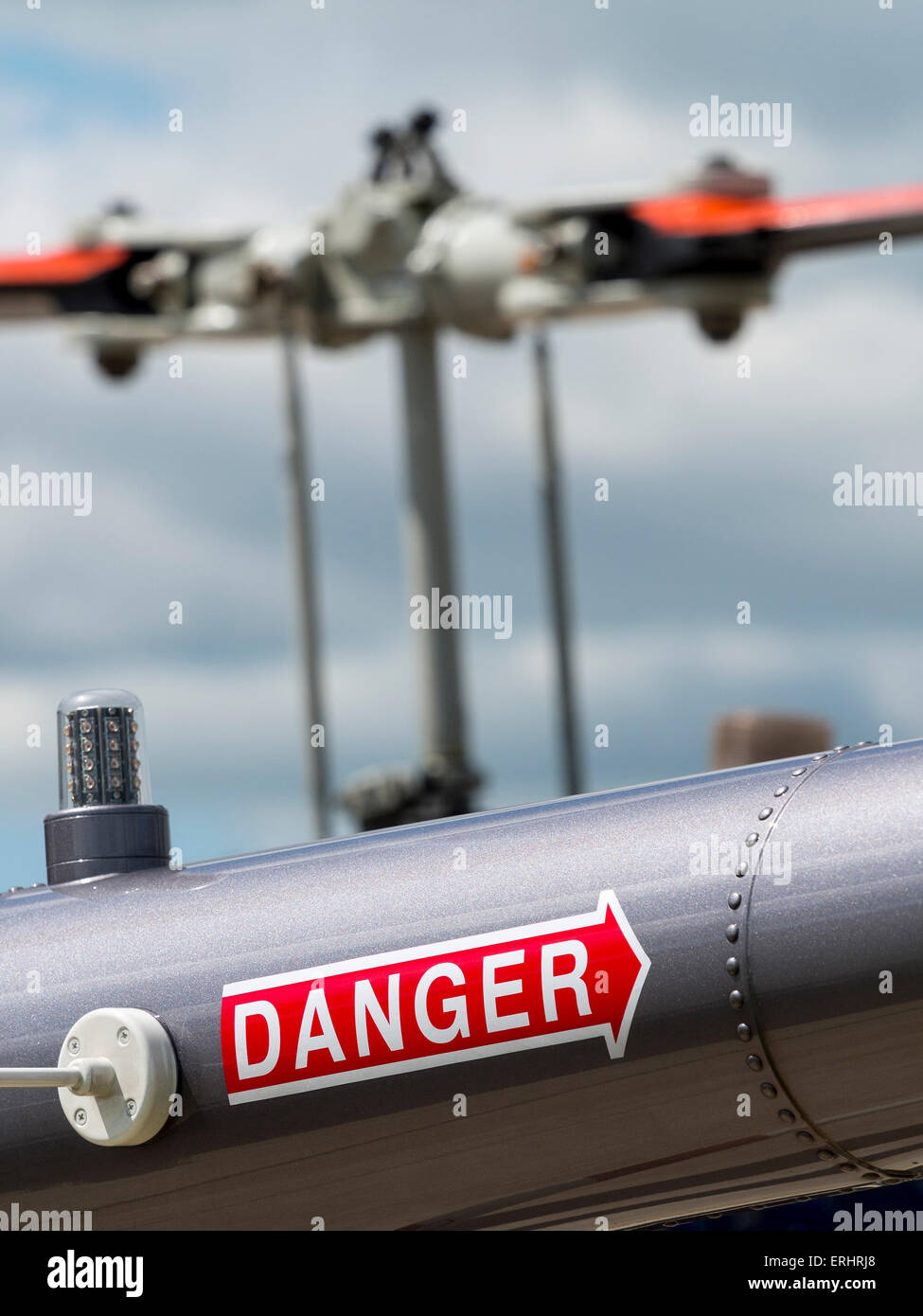 'Danger' warning sign near the tail rotor of a Robinson leisure ...