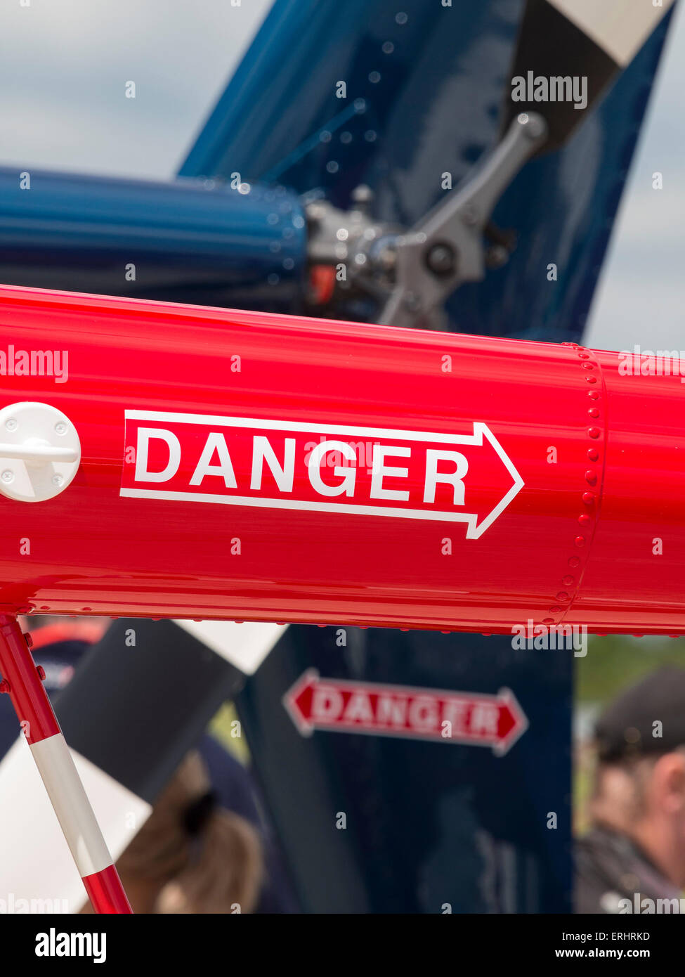 'Danger' warning sign near the tail rotor of a Robinson leisure ...