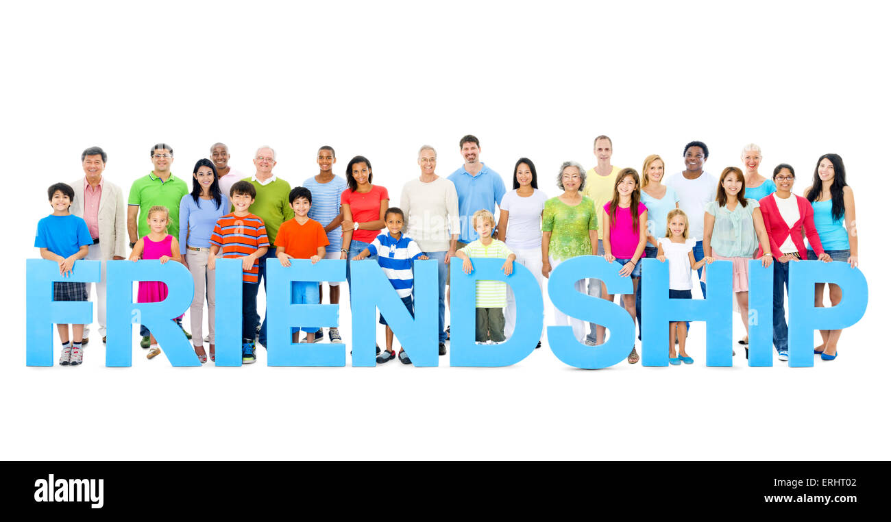 Multi-ethnic group of people holding "FRIENDSHIP" letters Stock Photo ...
