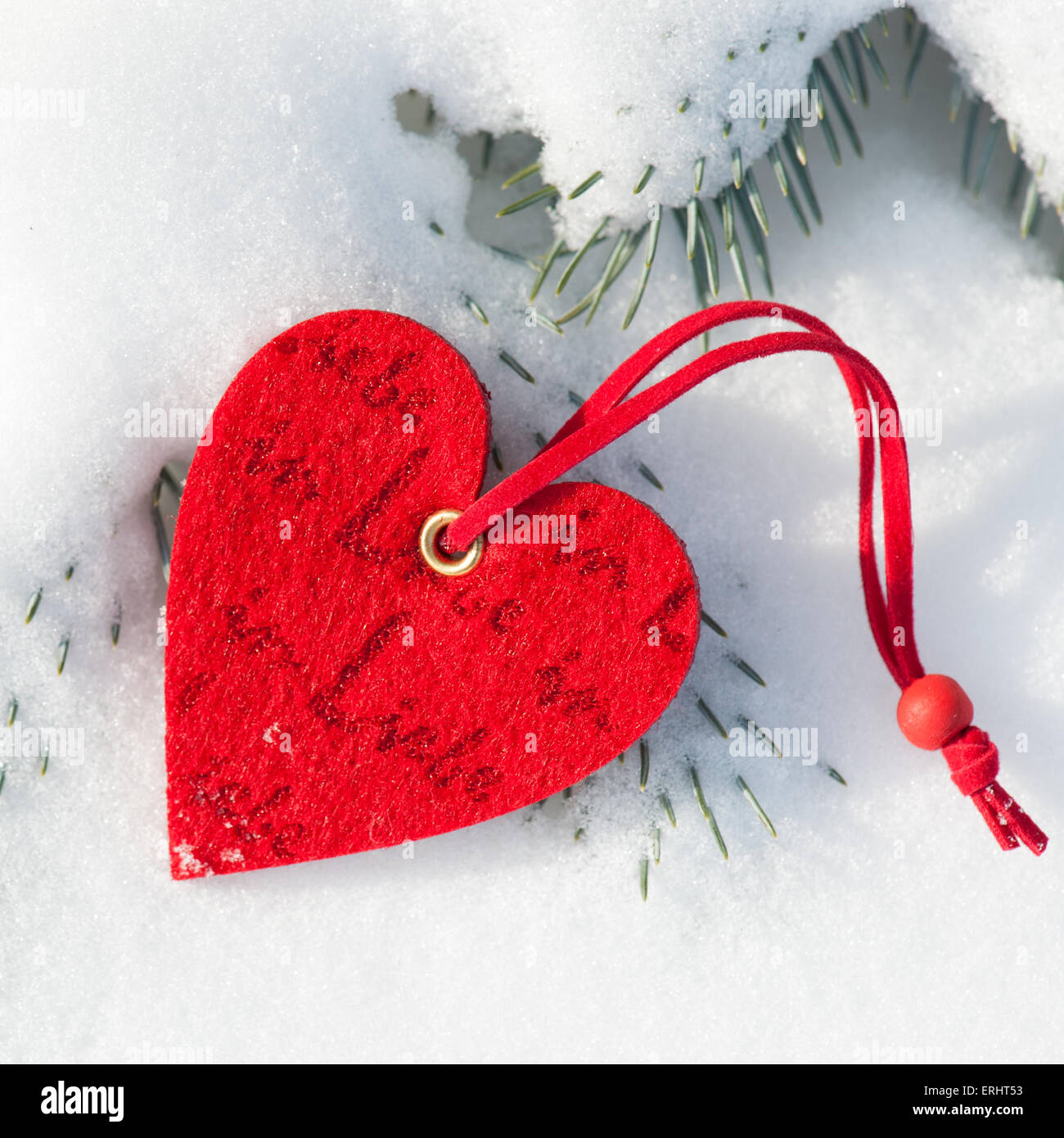 heart at snow on fir tree Stock Photo - Alamy