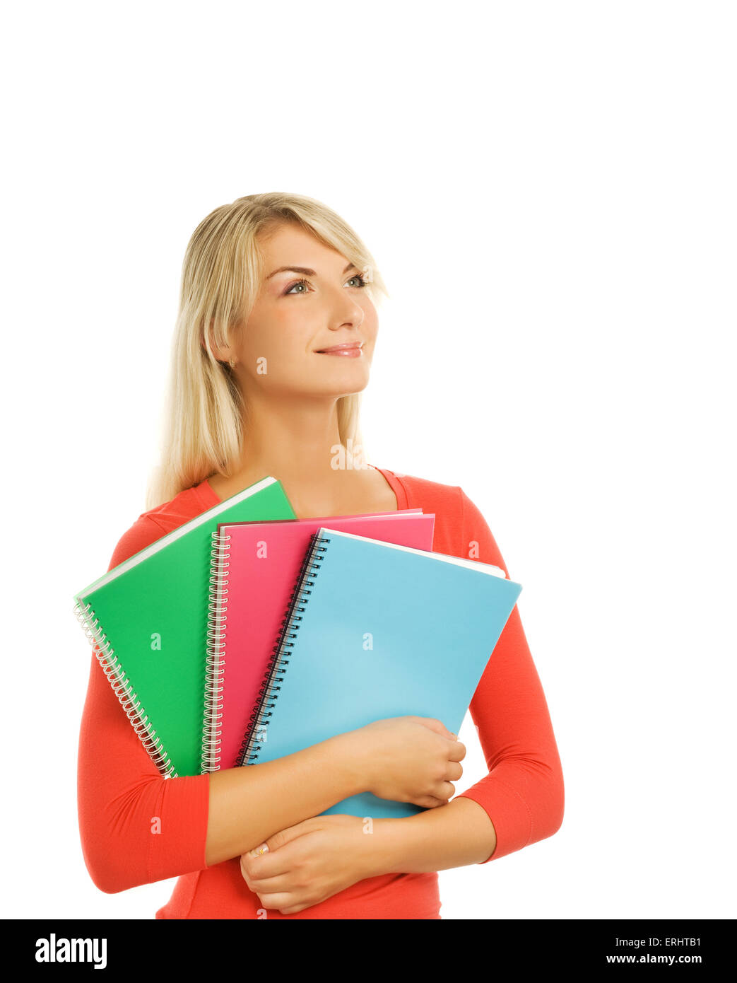 Attractive teenage girl with notebooks isolated on white background ...