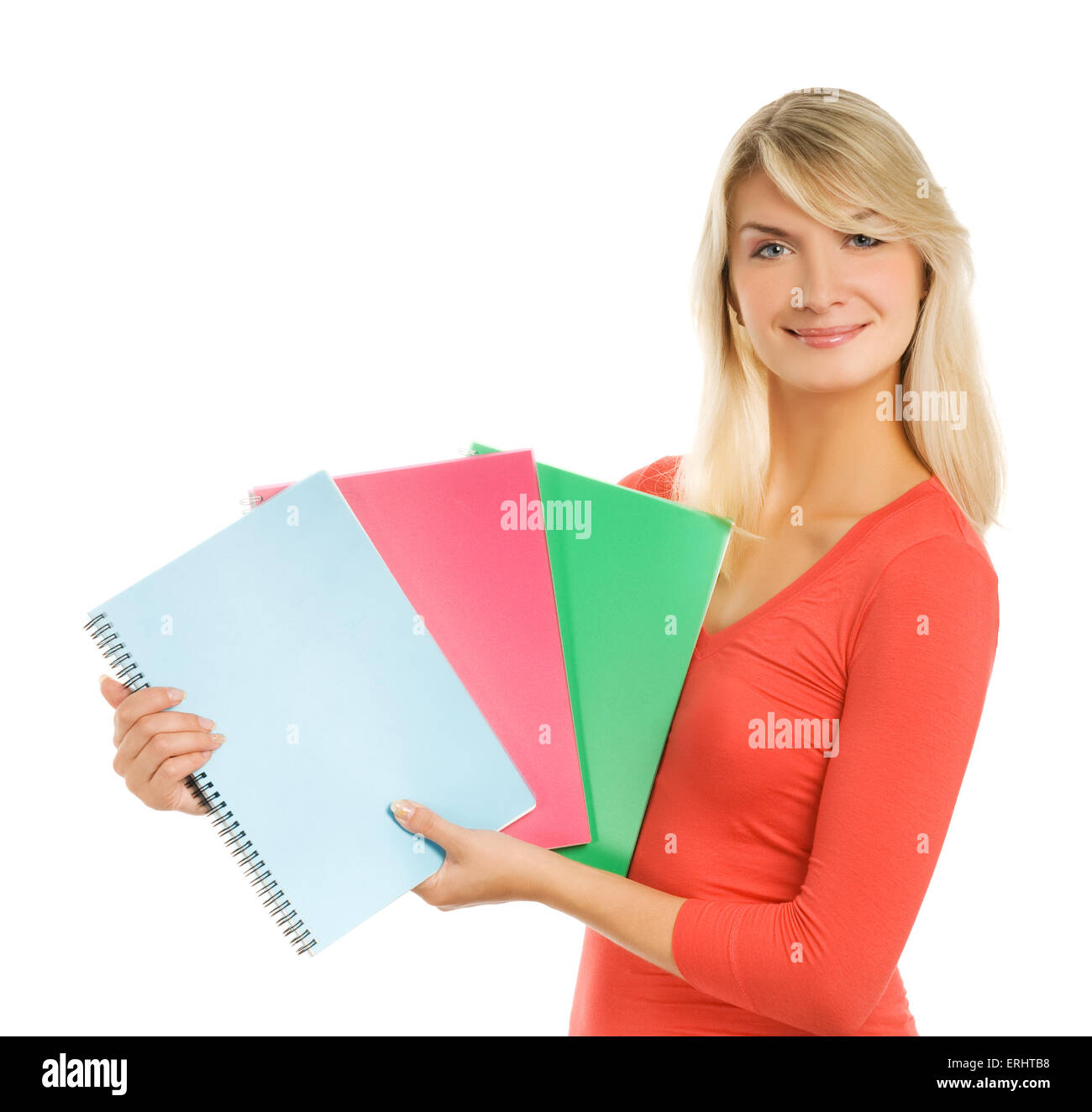 Attractive teenage girl with notebooks isolated on white background ...