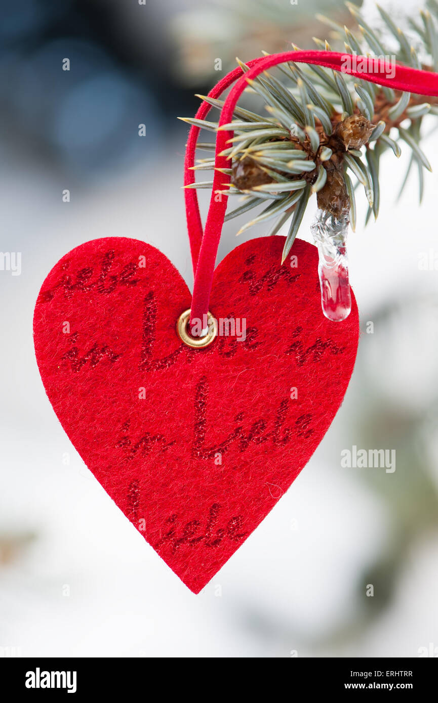 Heart on snow fir hi-res stock photography and images - Alamy