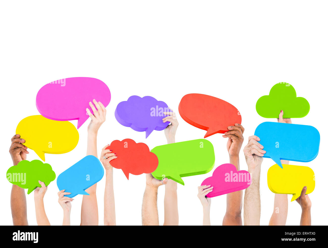 Hands holding multi colored speech bubbles Stock Photo - Alamy