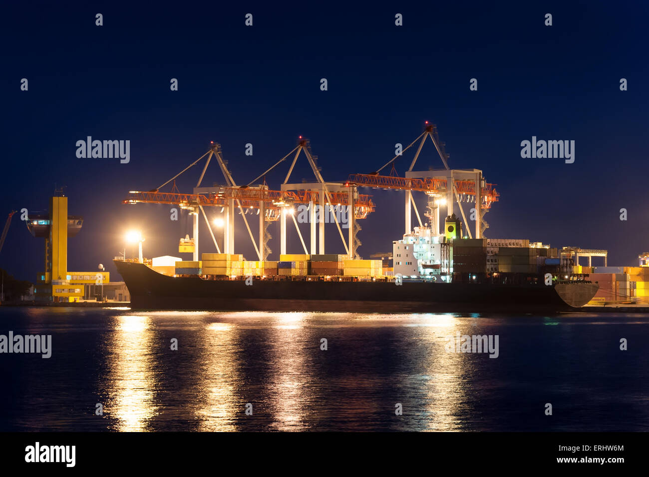 Container ship at night Stock Photo - Alamy