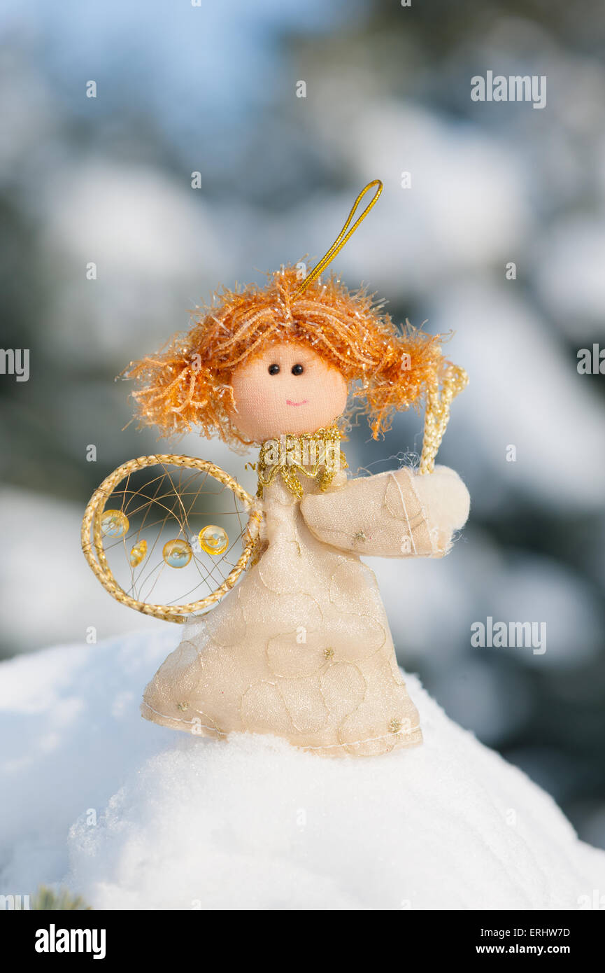 angel doll on snowdrift Stock Photo - Alamy