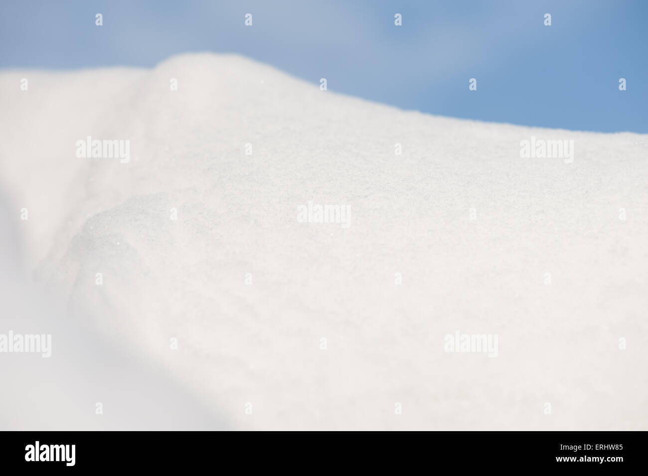 snowdrift on sky background Stock Photo - Alamy