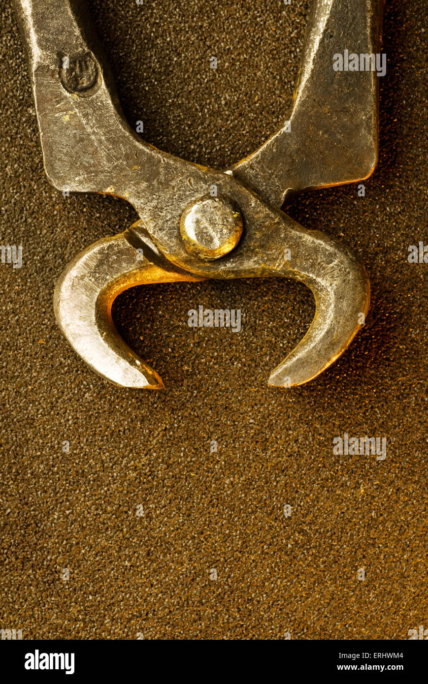 Old metal tongs Stock Photo - Alamy