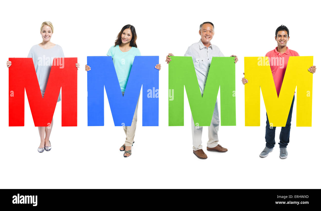 Multi-ethnic group of people holding letter "M Stock Photo - Alamy