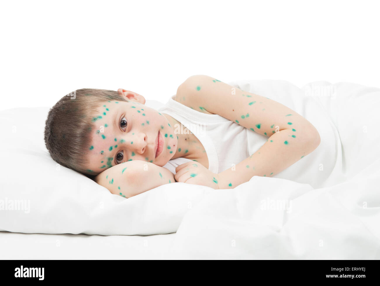 sick boy lying in white bed Stock Photo - Alamy