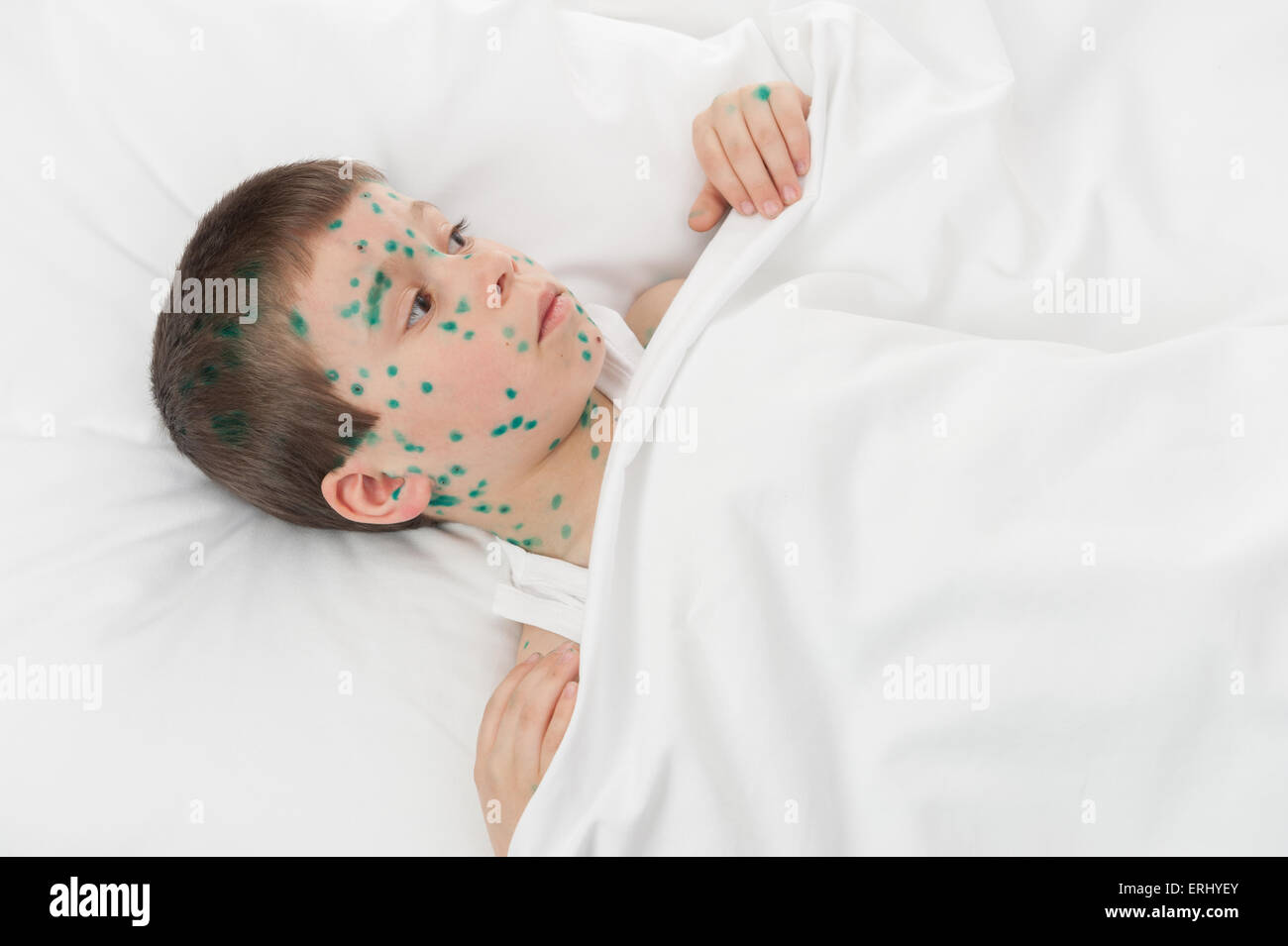sick boy in a white bed Stock Photo - Alamy