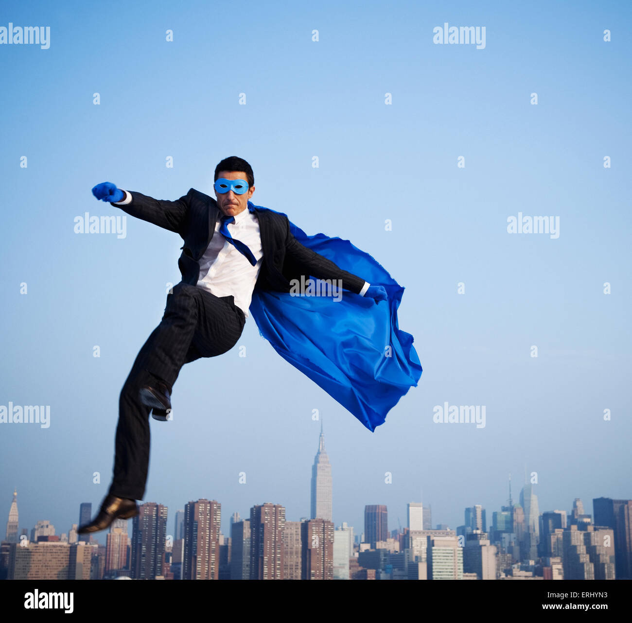 Superhero businessman over New York City Stock Photo - Alamy