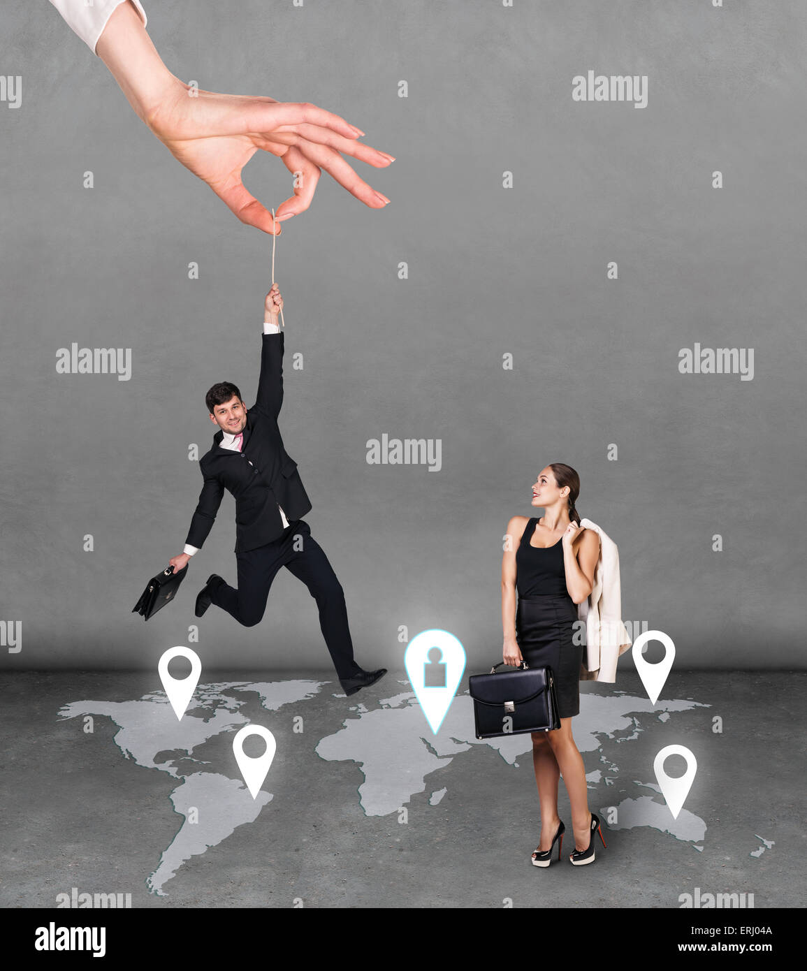 Big hand holding a business man Stock Photo - Alamy