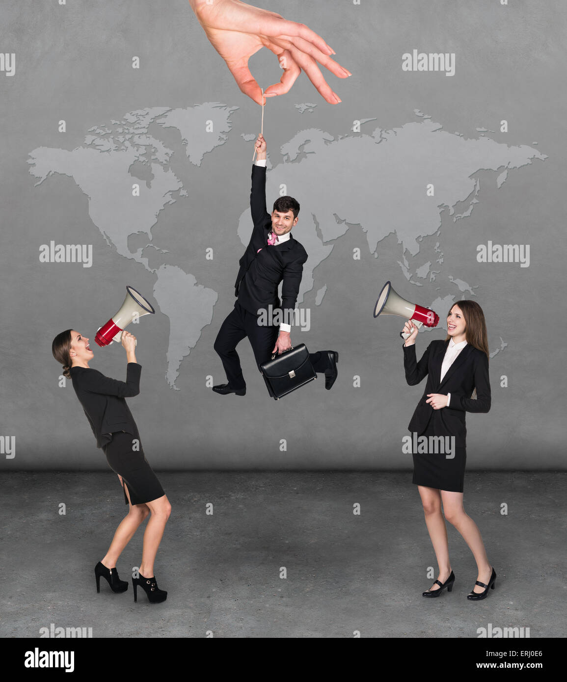 Big hand holding a business man Stock Photo - Alamy