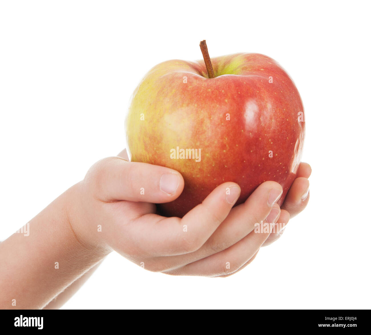 red apple in child hands isolated Stock Photo - Alamy