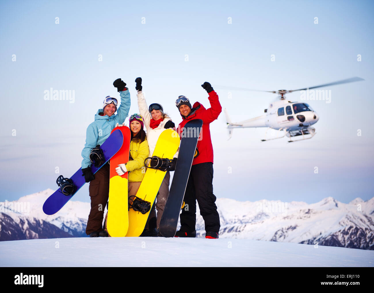 Snowboarders on top of the Mountain with Heli Ski Stock Photo - Alamy