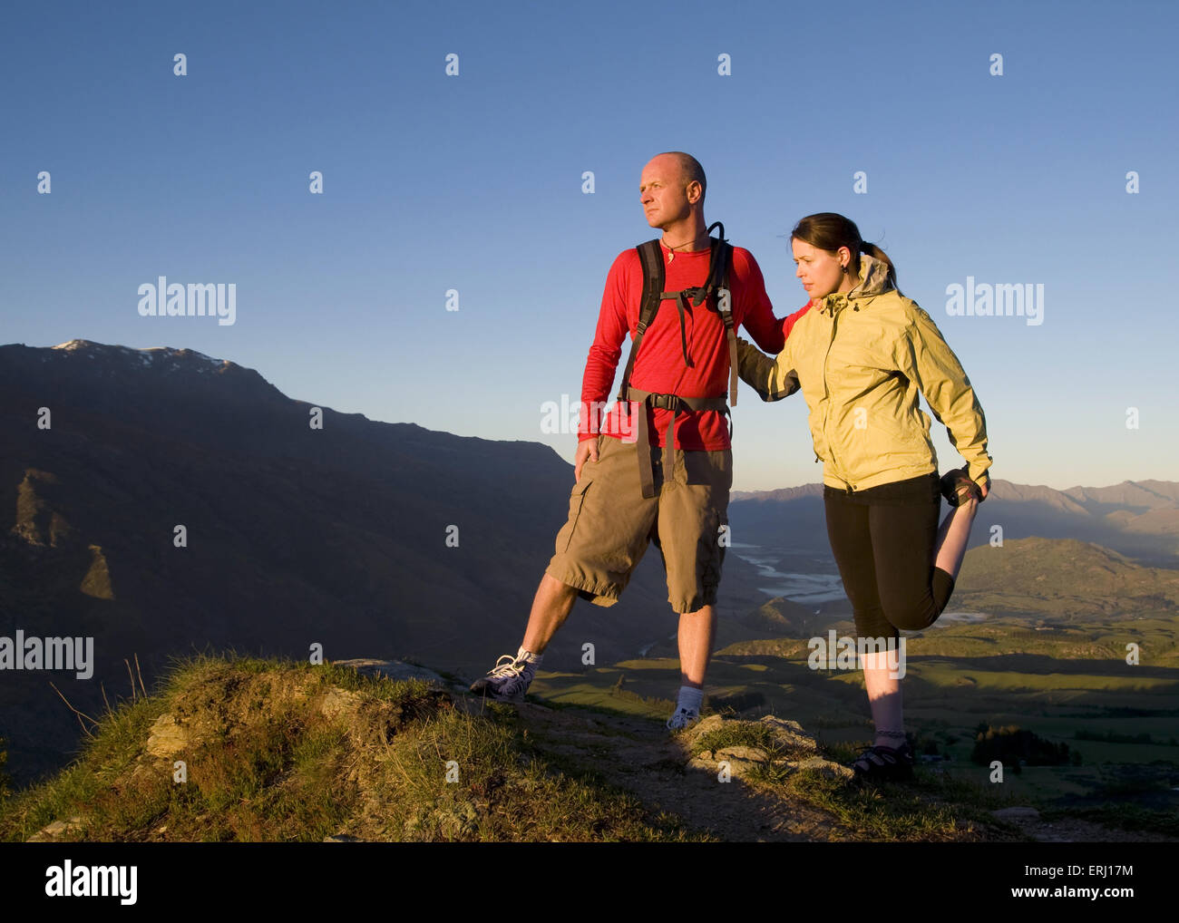 Extreme athletes exercising in the mountains. Queenstown, New Zealand ...