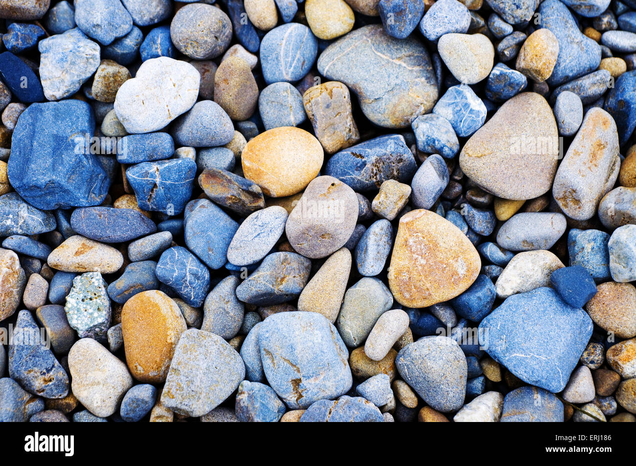 Multi colored Pebbles rocks backgrounds Stock Photo - Alamy