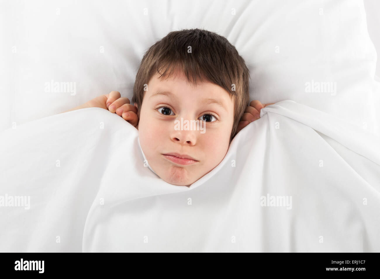cheerful boy in white bed Stock Photo - Alamy cheerful boy in white bed Stock Photo - Alamy