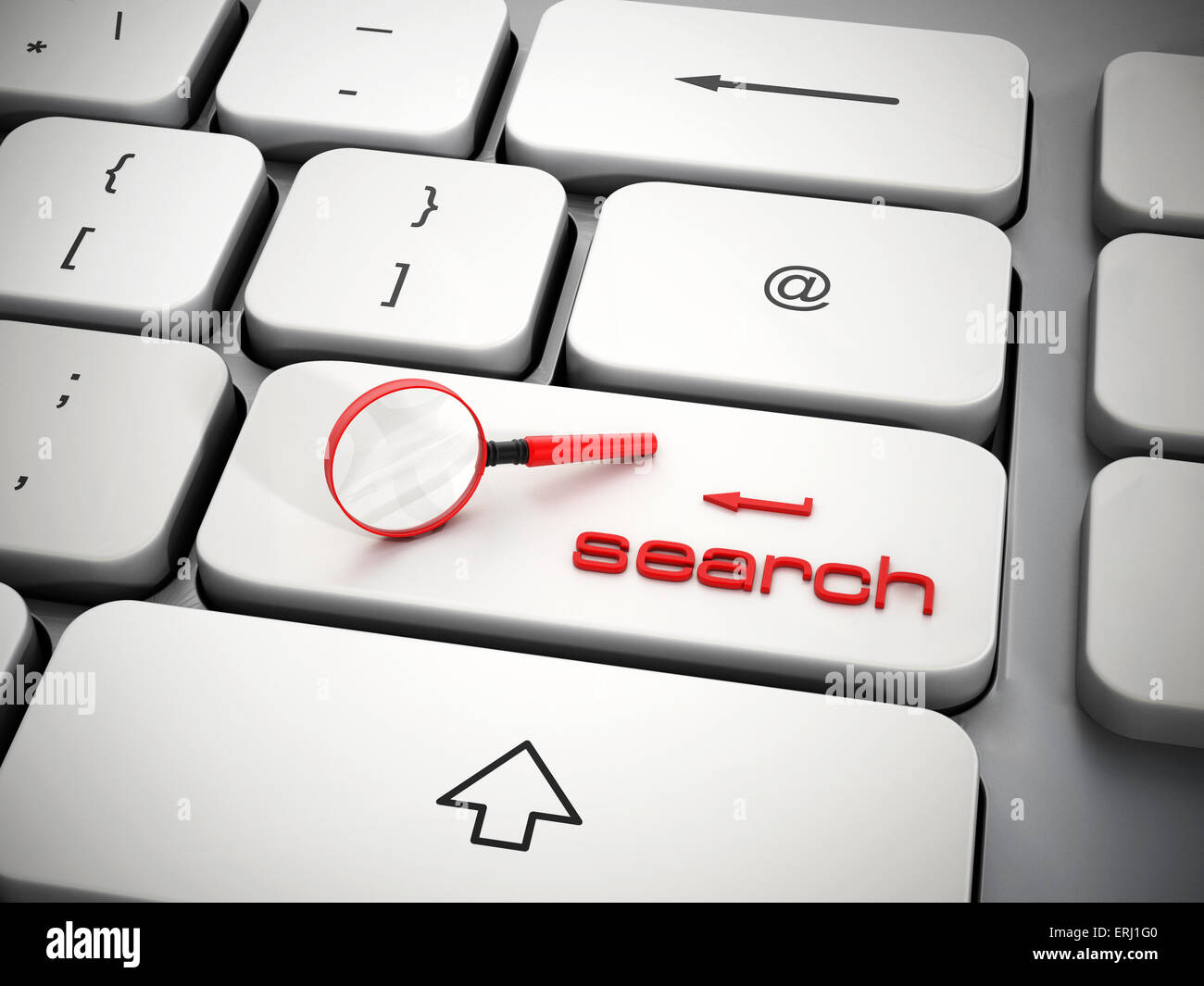 Magnifying glass on search key of the keyboard Stock Photo - Alamy