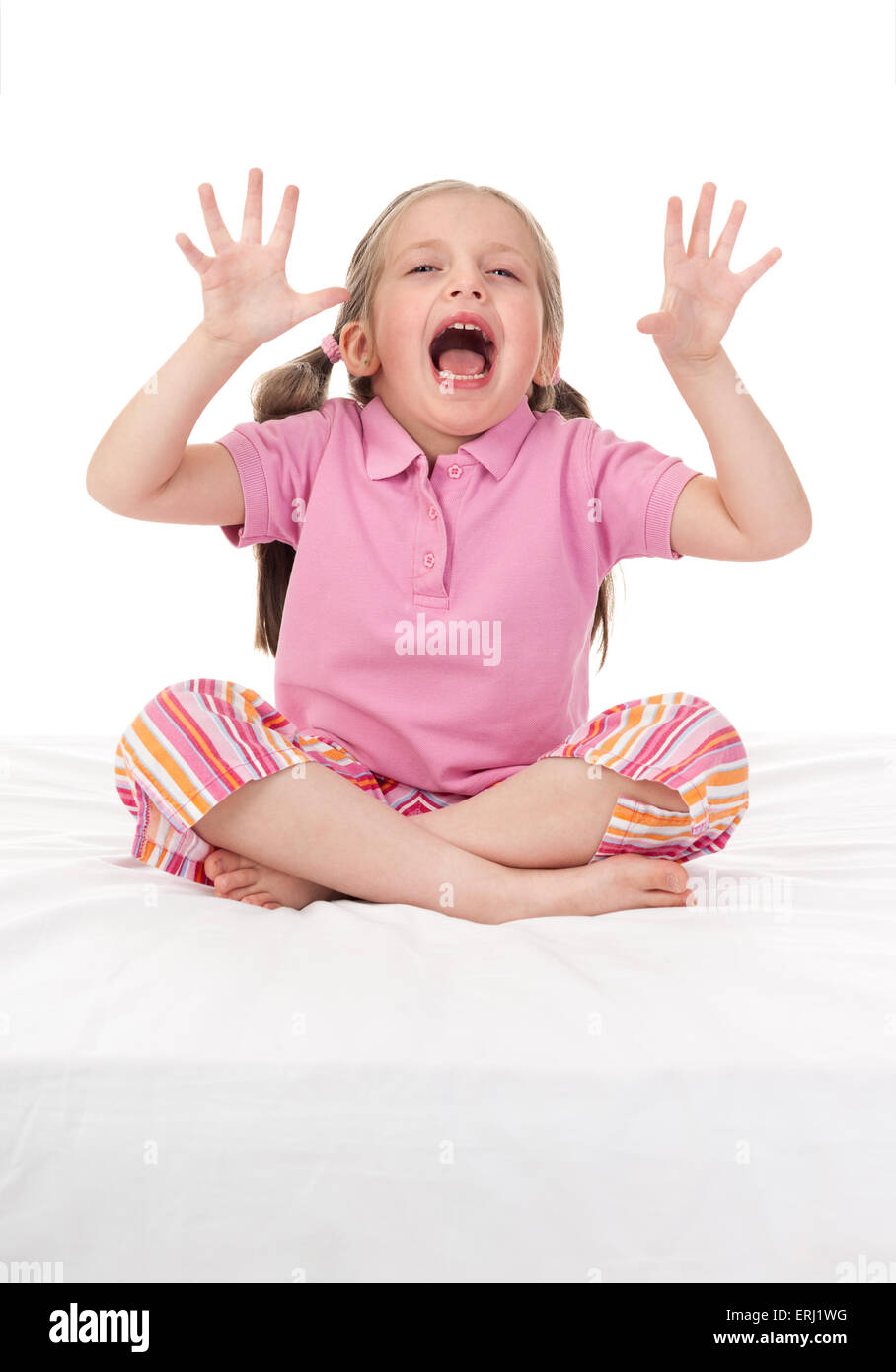 cheerful girl in sleepwear wake up Stock Photo - Alamy