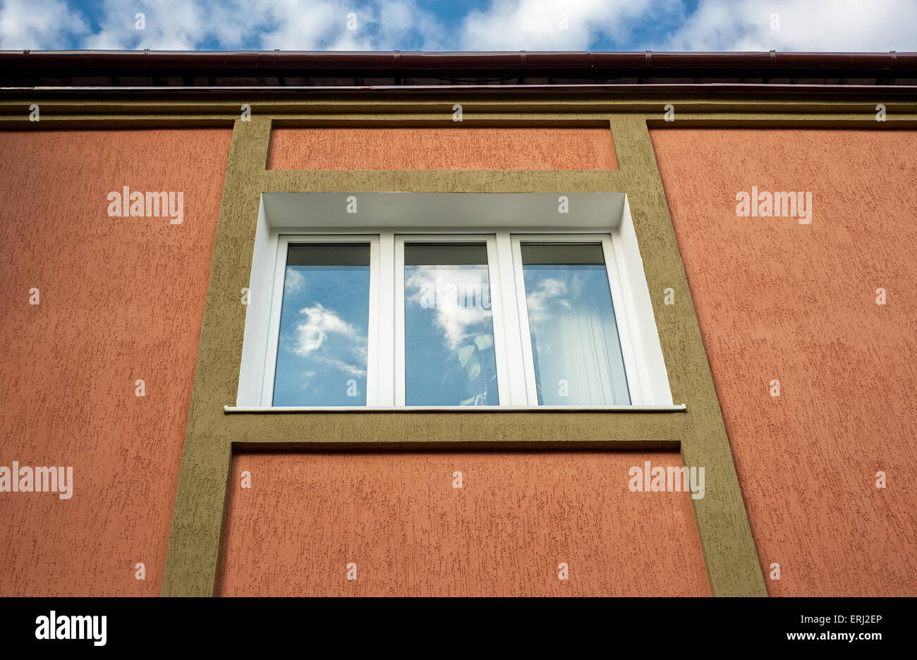architectural details. window in a building with a brown stucco Stock ...