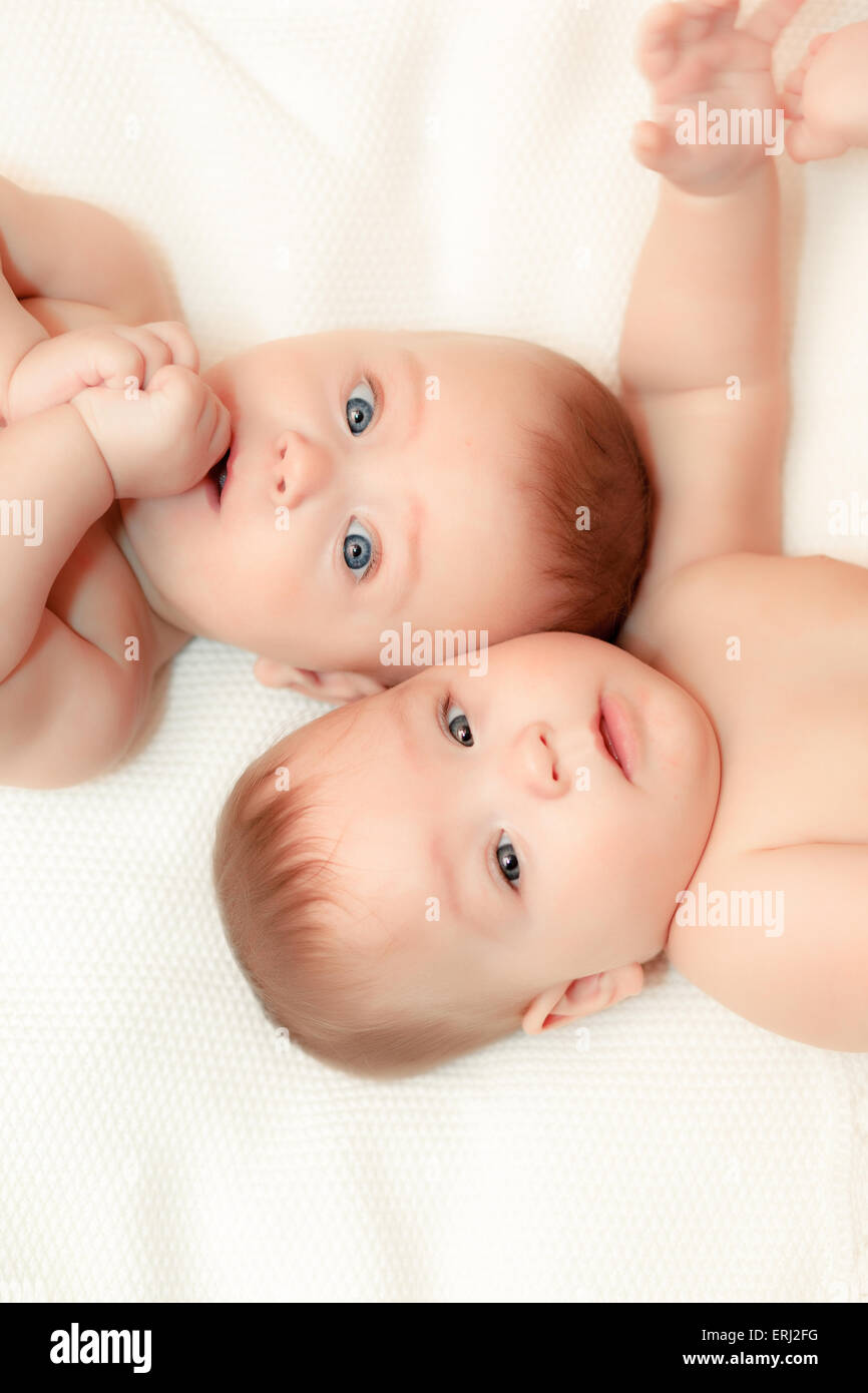 Two twin babies, girls Stock Photo - Alamy