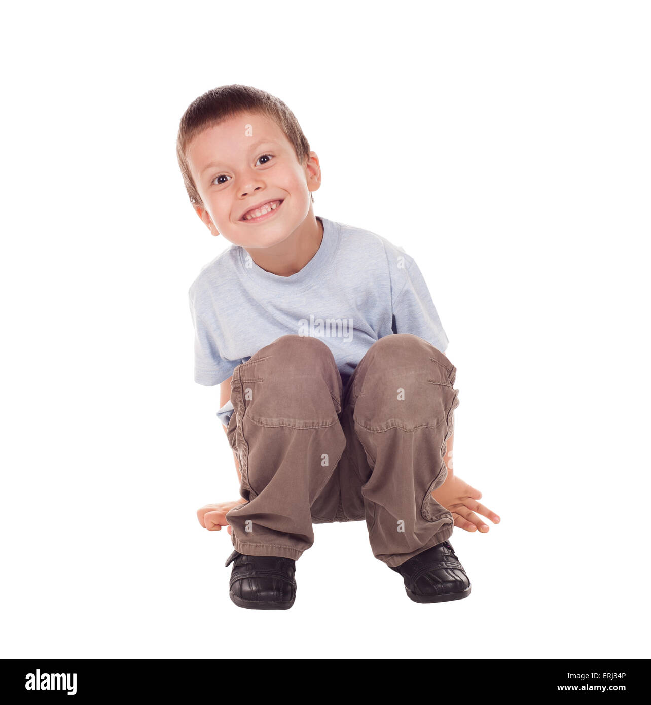 surprised boy sit down Stock Photo - Alamy
