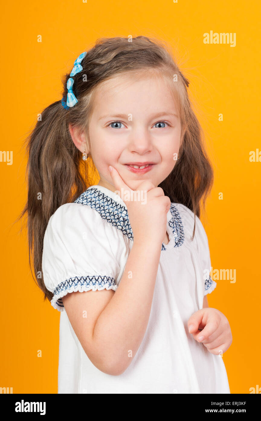 Child girl portrait touch face closeup hi-res stock photography and ...