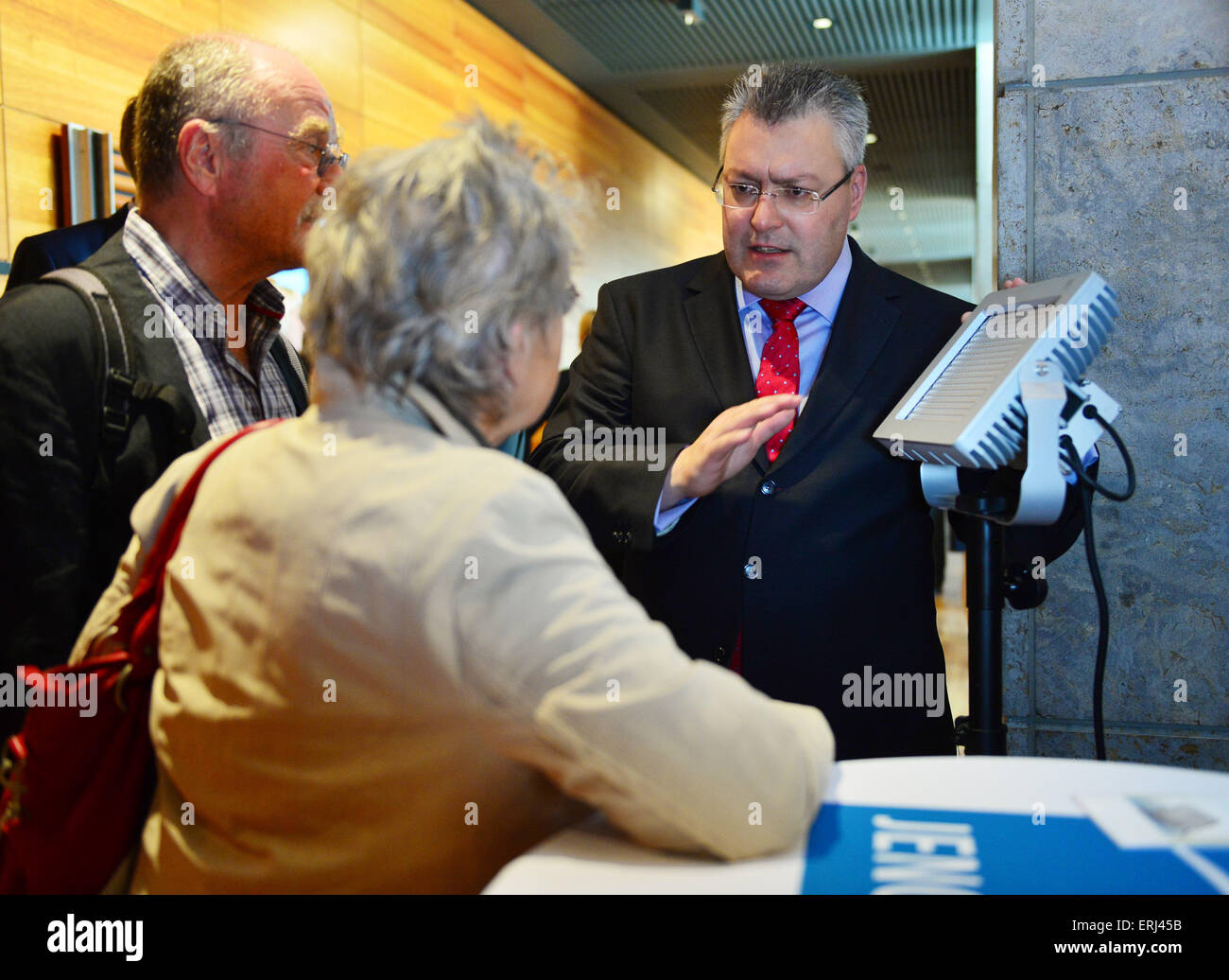 Weimar, Germany. 03rd June, 2015. CEO Michael Mertin (R) demonstrates ...