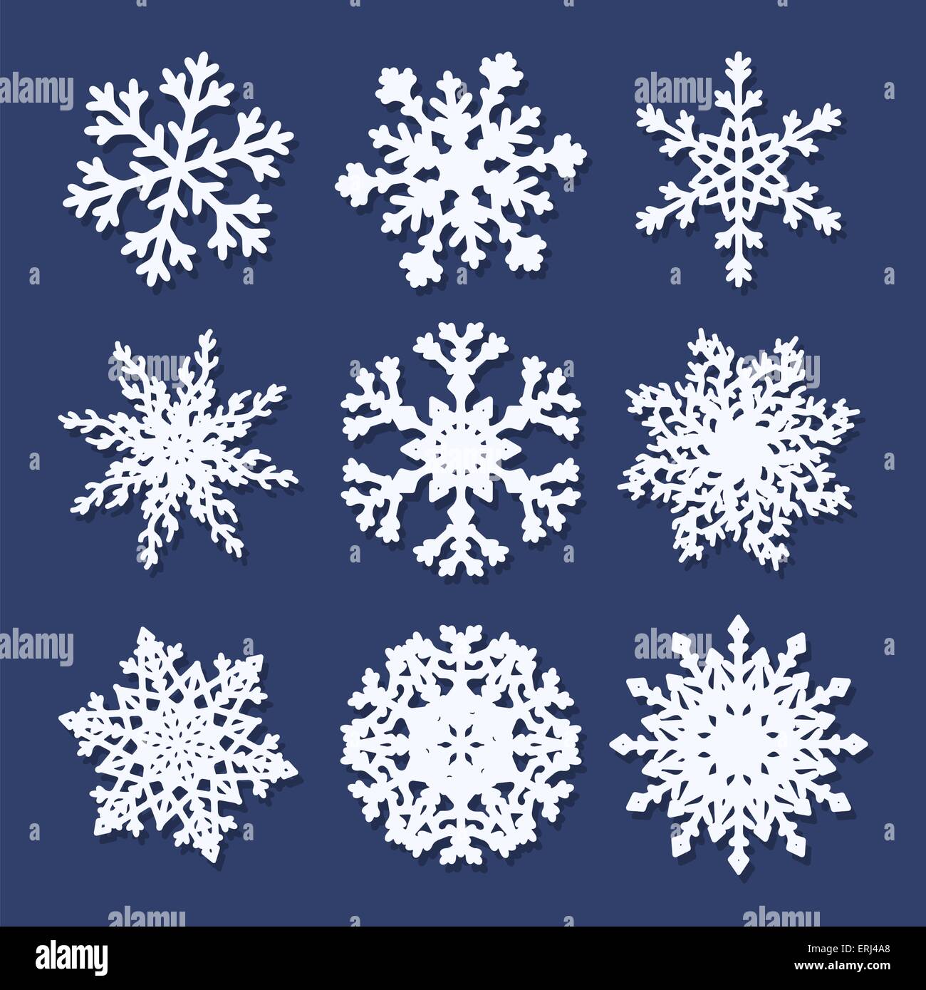 Set of white paper snowflakes isolated on blue background. Vector ...