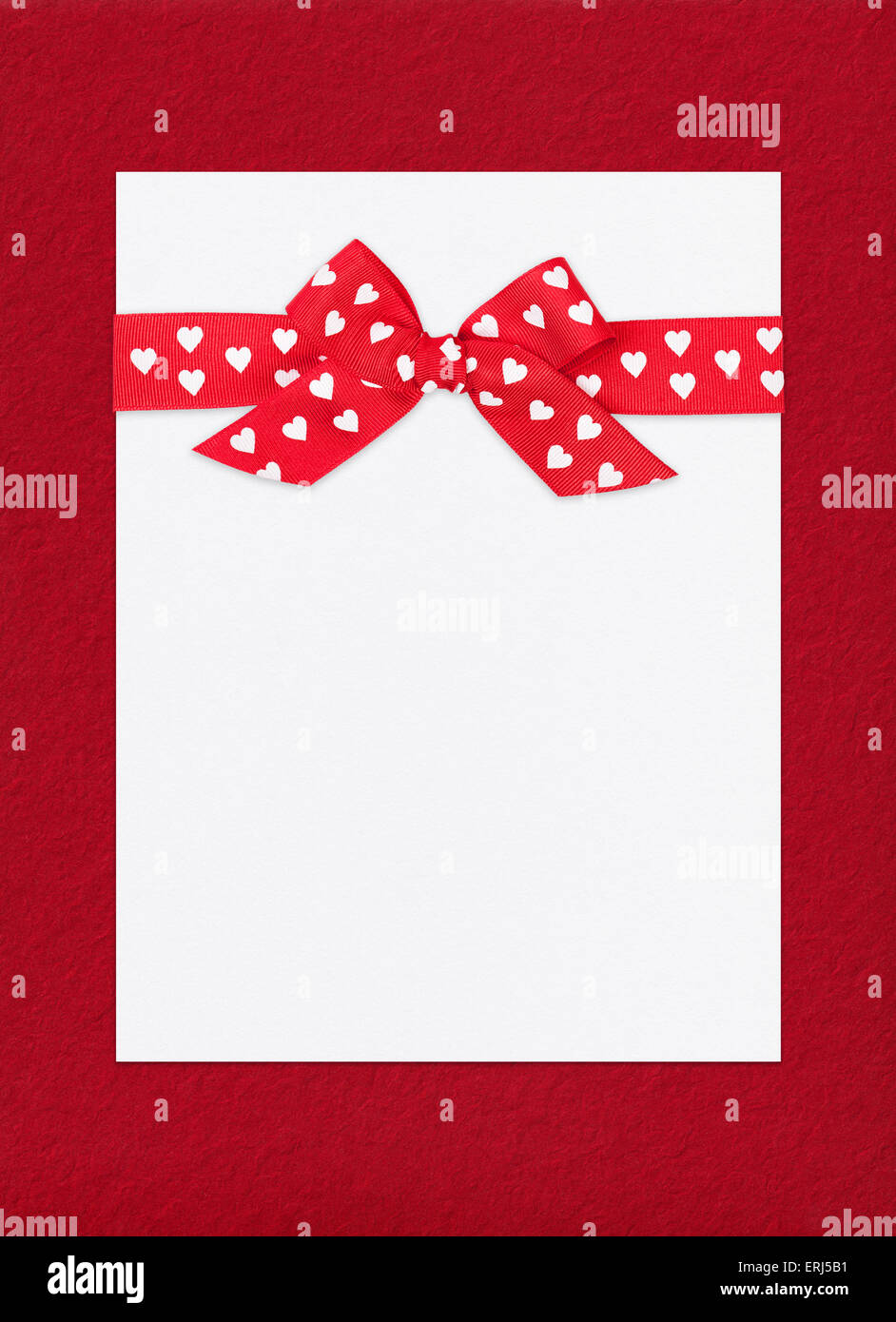 big red bow on paper sheet Stock Photo - Alamy
