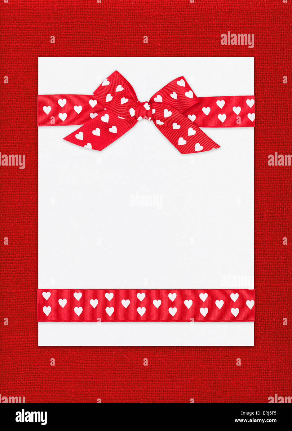 big red bow on paper sheet Stock Photo - Alamy
