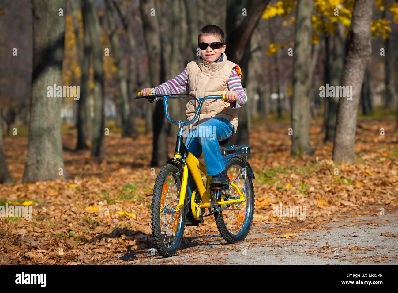 Boy rides bike park hi-res stock photography and images - Alamy