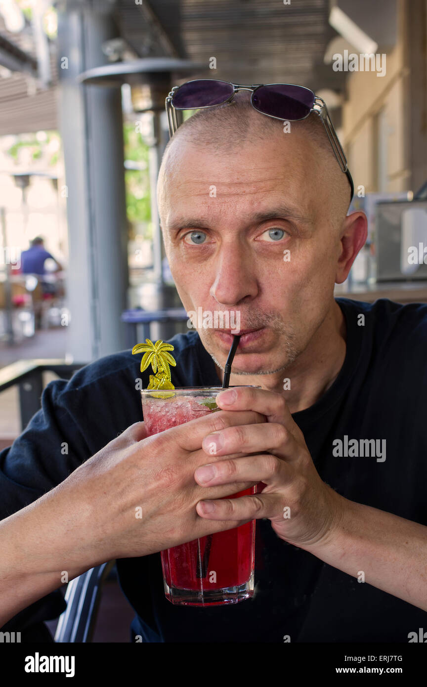 Man With A Drinking Straw Stock Photo - Alamy