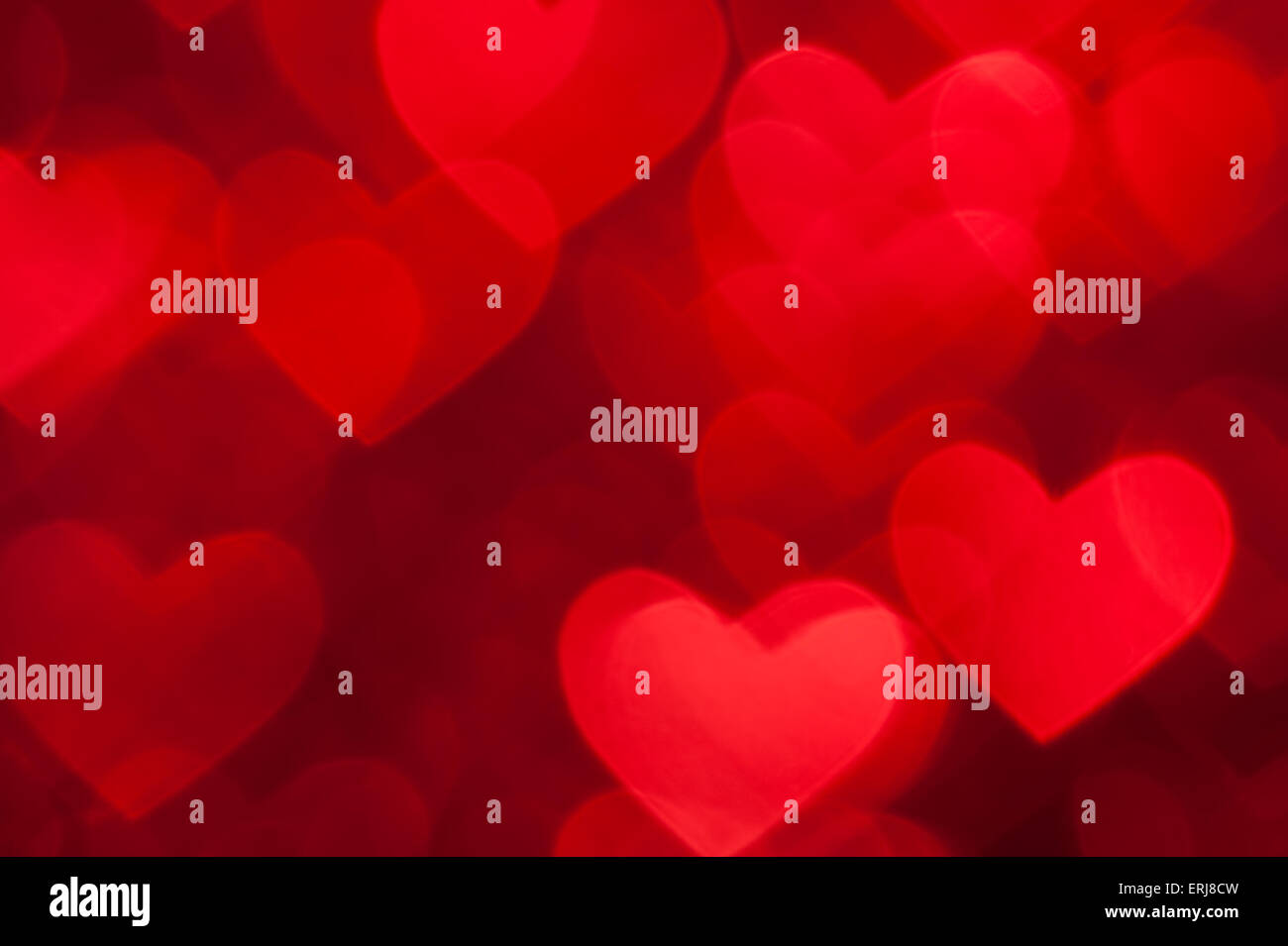 red hearts bokeh as background Stock Photo - Alamy