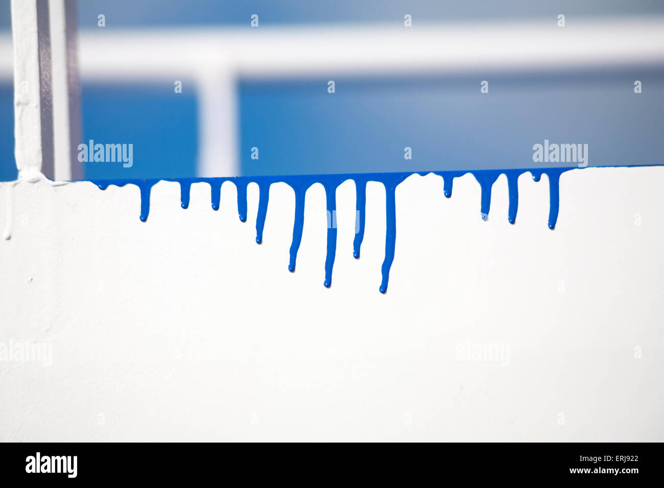 Blue paint drips abstract on white Stock Photo - Alamy