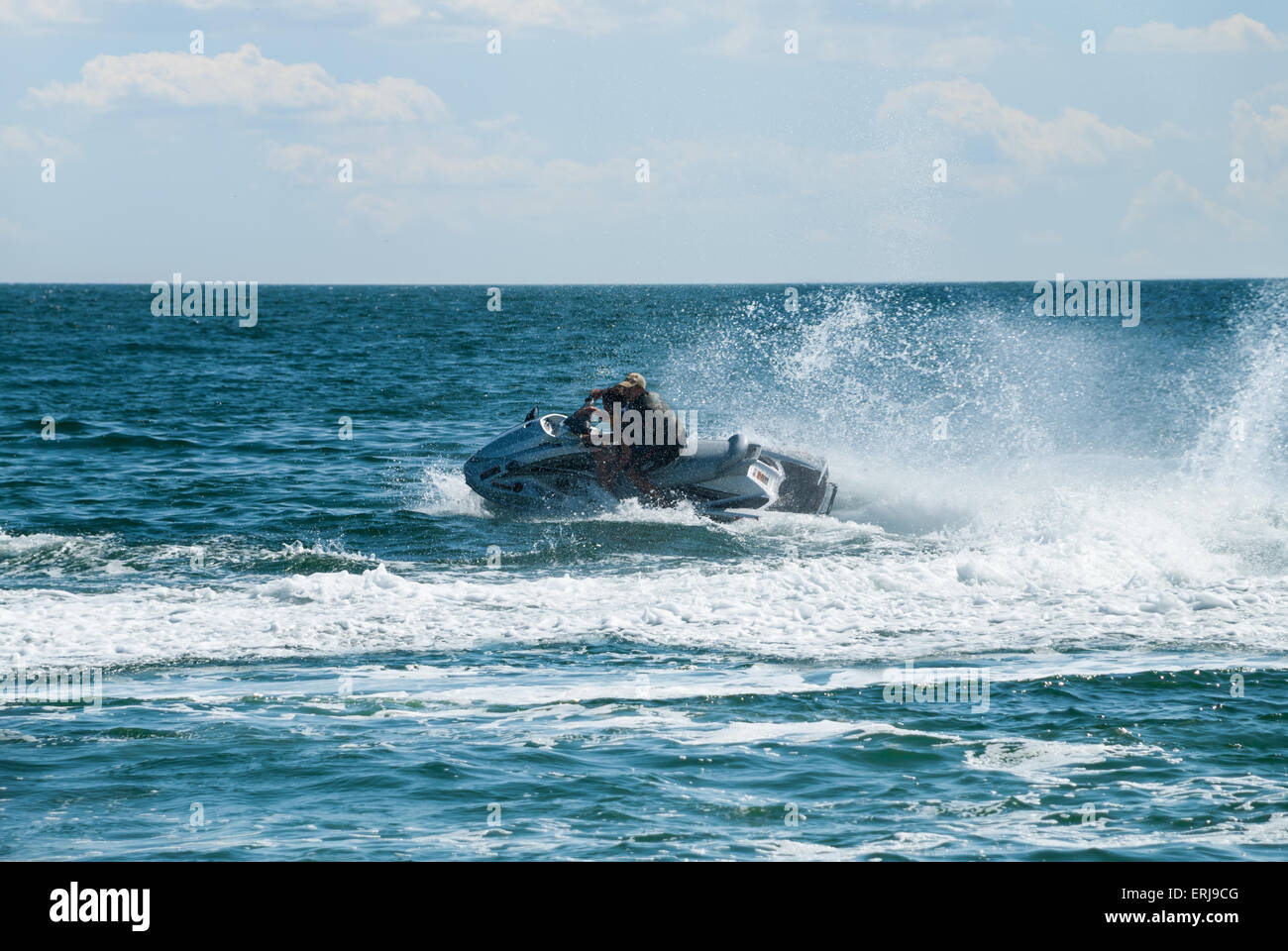 High speed jet ski with water spray Stock Photo - Alamy