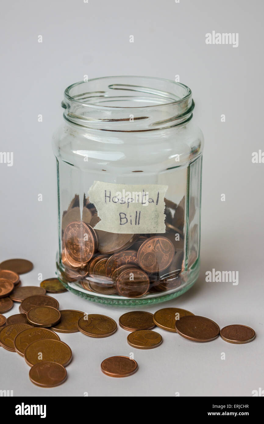 Jar with coins. Savings and tips Stock Photo - Alamy