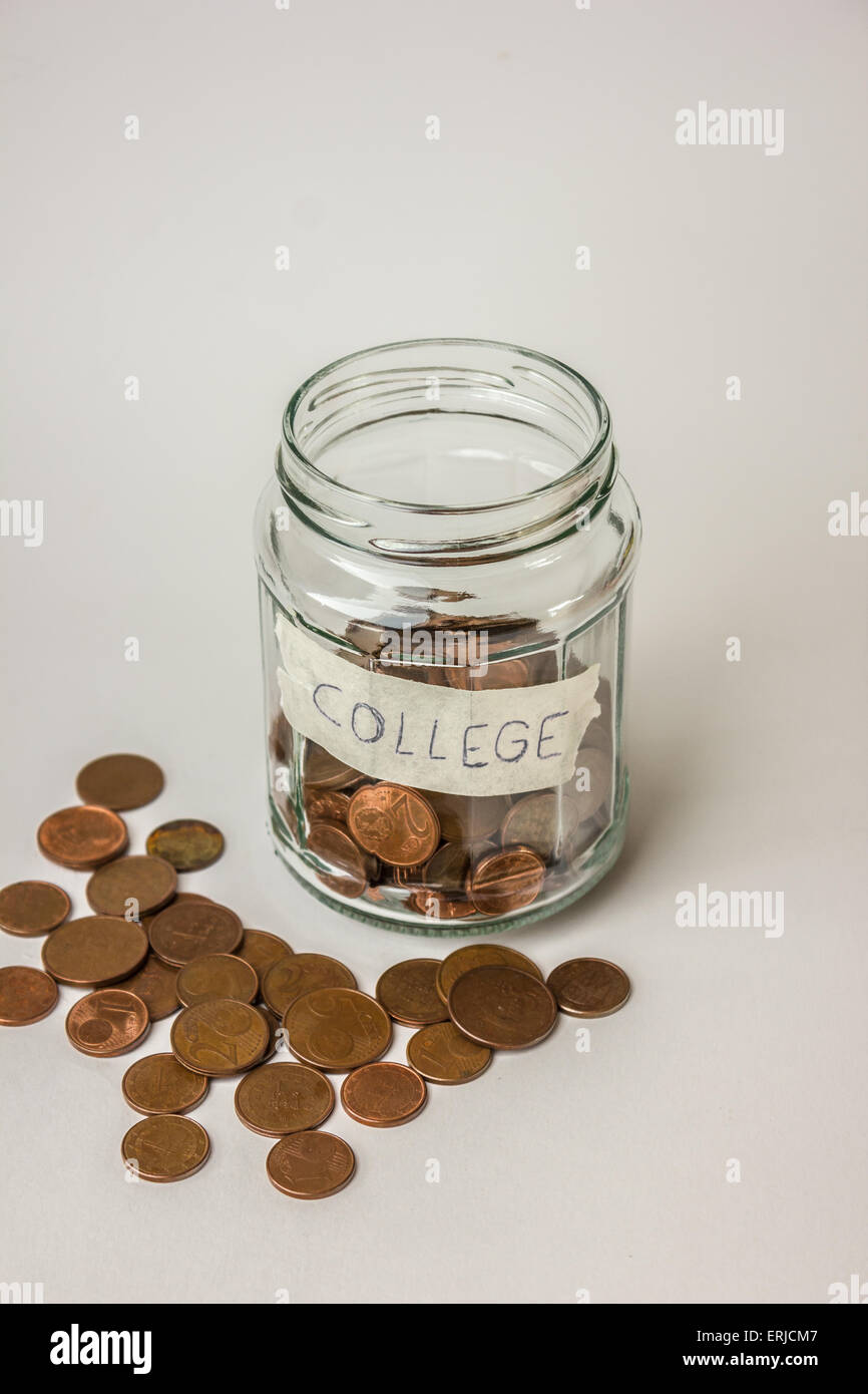 Jar with coins. Savings and tips Stock Photo - Alamy