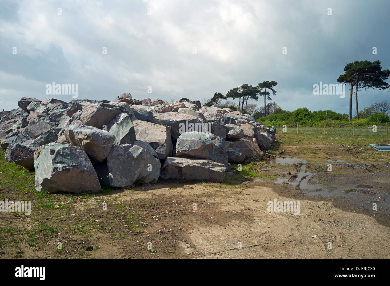 Rock armour stockpiled for ongoing coastal defence work, East Lane ...