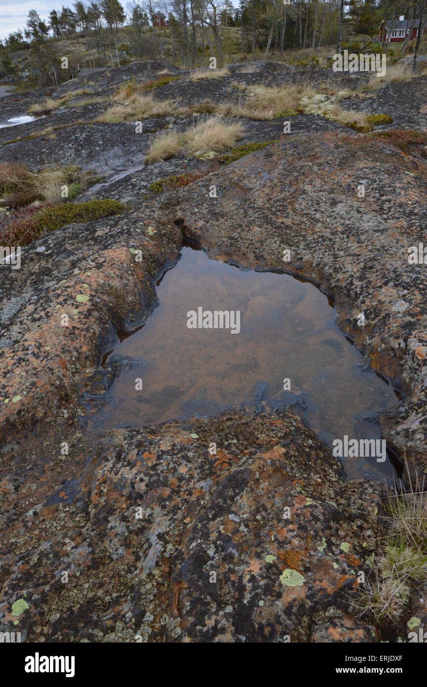 Puddle on rock hi-res stock photography and images - Alamy