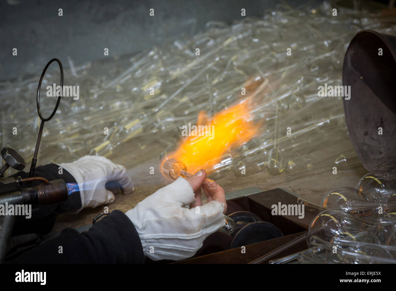 Worker completes glass ornaments in Slezska Tvorba factory in Opava ...